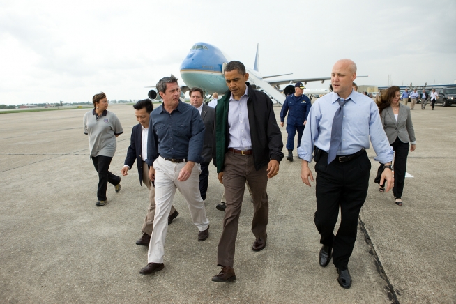 President Barack Obama walks to the tarmac field house at Louis ...