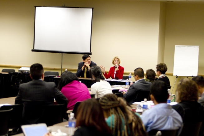 Community members engage with Kristi Barrows and Stephen Chen on the ...