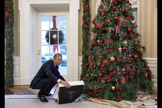 President Obama Opens A Christmas Gift | The White House